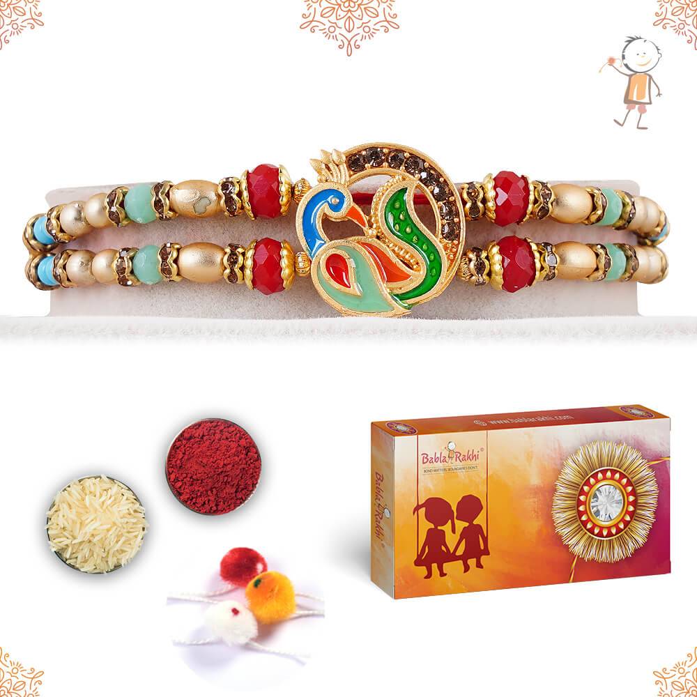 Dazzling Peacock Rakhi With Two Line Beads Rakhi | Dazzling Peacock ...