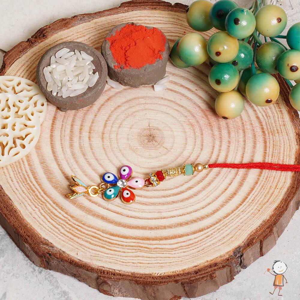 Colorful Evil Eye Flower Bhabhi Lumba Rakhi | Colorful Evil Eye Flower ...