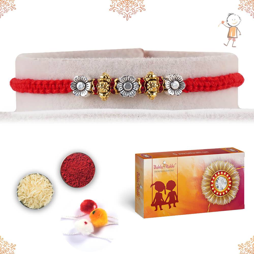 Uniqualy Handcrafted Dilver Rakhi In Combination Of Golden Beads ...